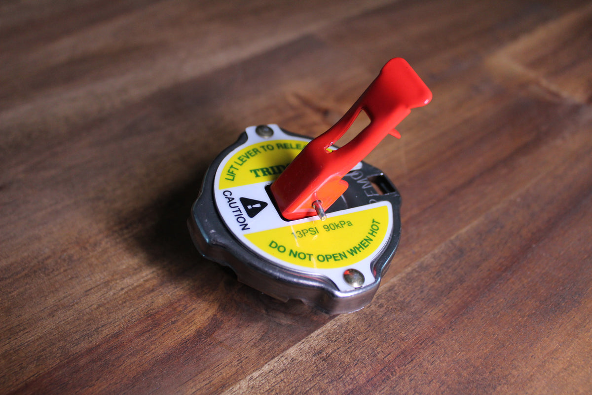 Radiator cap with lever release – Ellery Motorsport